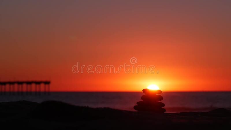 Stack of Pebble Stones, Sandy Ocean Beach, Sunset Sky. Rock Balancing ...