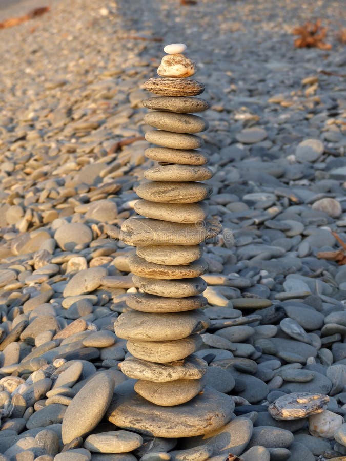 Stack of Pebbles Left by Beach Travelers Stock Photo - Image of stack ...