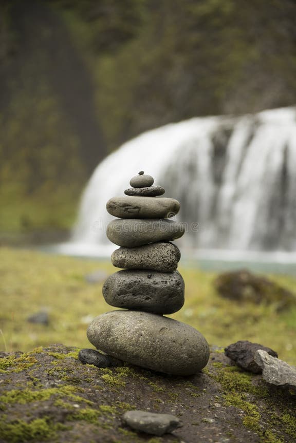 Stack of Pebbles and Waterfall Stock Image - Image of beauty, balance ...