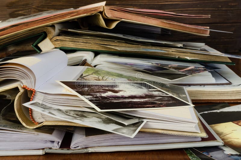 Stack of Photo Albums and Scattered Photographs Stock Image - Image of ...