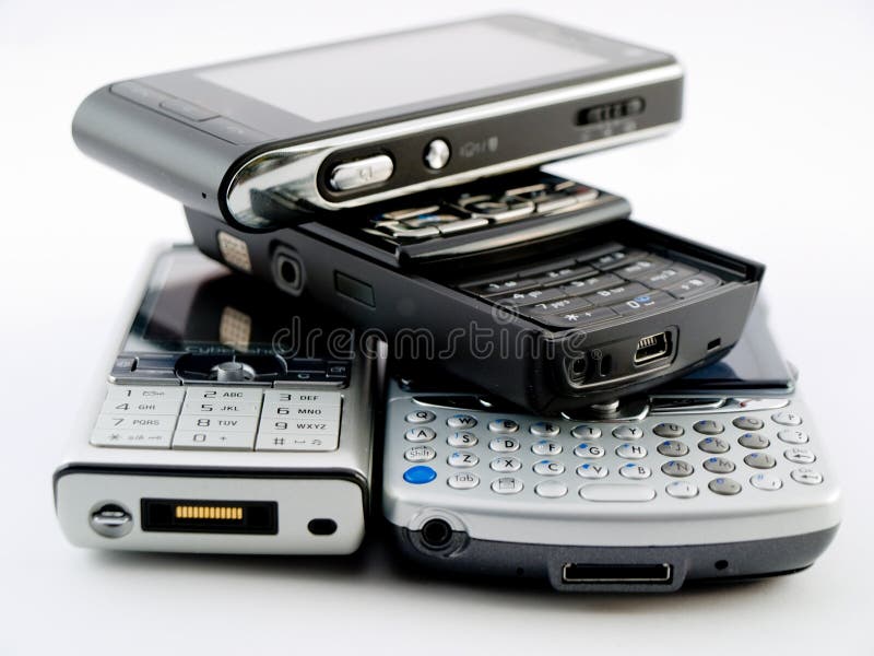 Stack Pile of Several Modern Mobile Phones PDA Stock Photo - Image of ...