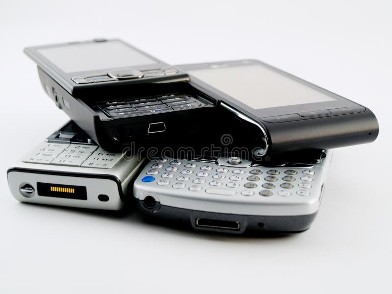 Stack Pile of Several Modern Mobile Phones PDA Stock Image - Image of ...