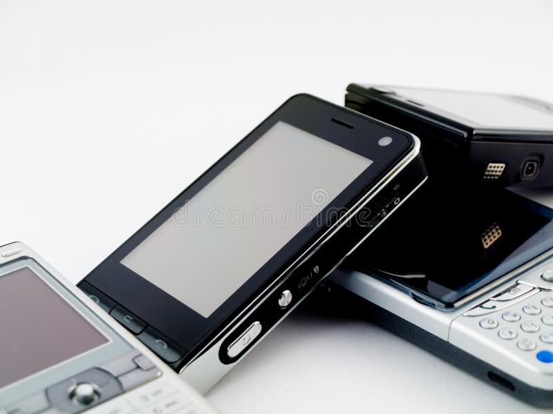Stack Pile of Several Modern Mobile Phones PDA Stock Image - Image of ...