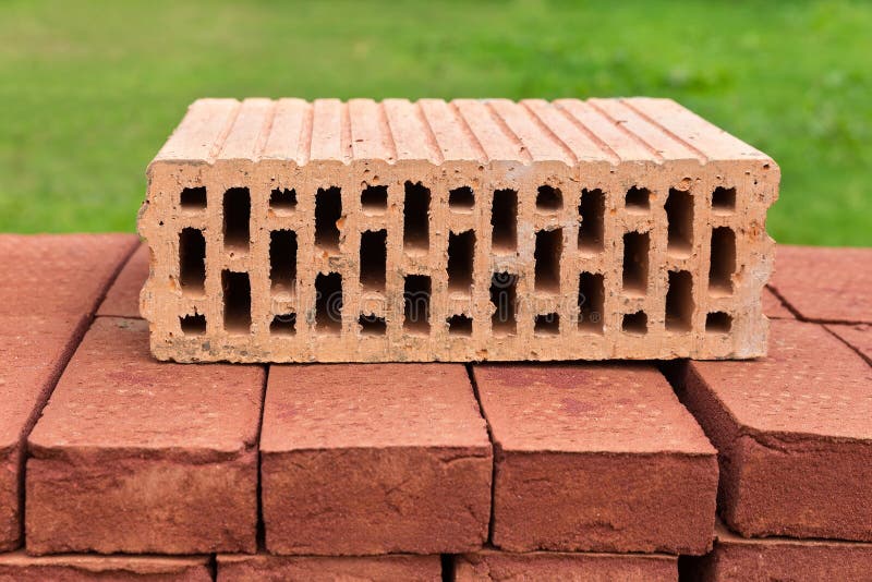 Stack of Piled New Wall Bricks Outside Stock Photo - Image of stacked ...