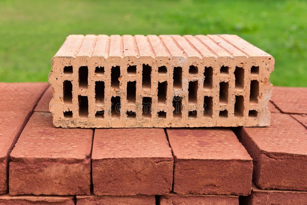 Stack of Piled New Wall Bricks Outside Stock Photo - Image of stacked ...