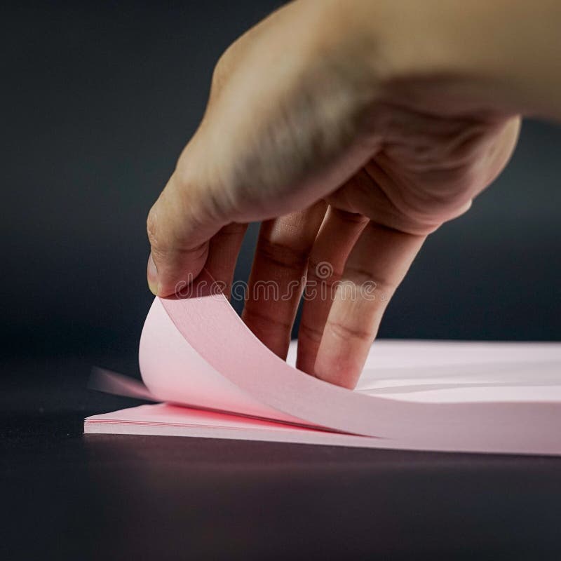 Stack of Pink Colored Paper with Hand on Frame Stock Photo - Image of ...