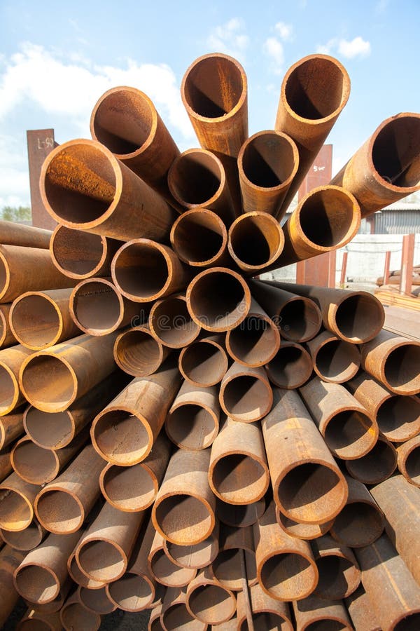 Stack of pipes stock photo. Image of rusted, round, rusty - 63057396
