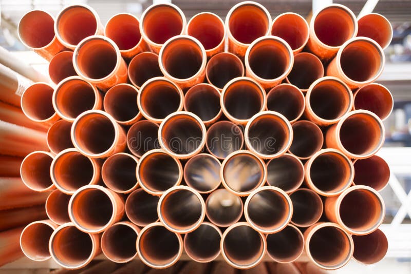 Stack of Pipes on Sale in a Factory Stock Image - Image of pipes ...