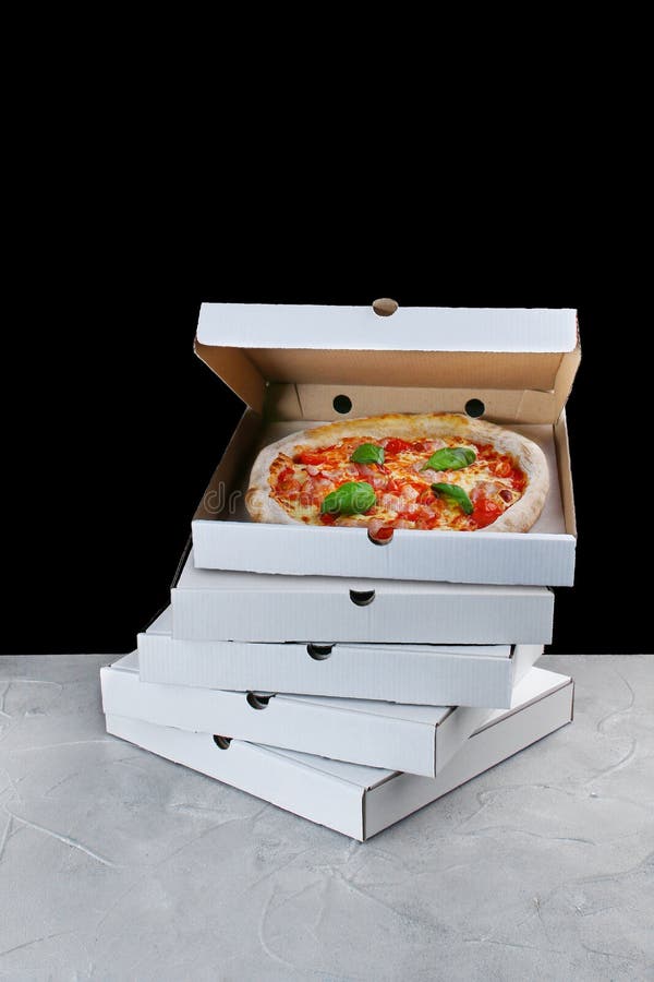 Stack of Pizza Box with Pizza Inside. Pizza Delivery. Box on Black ...