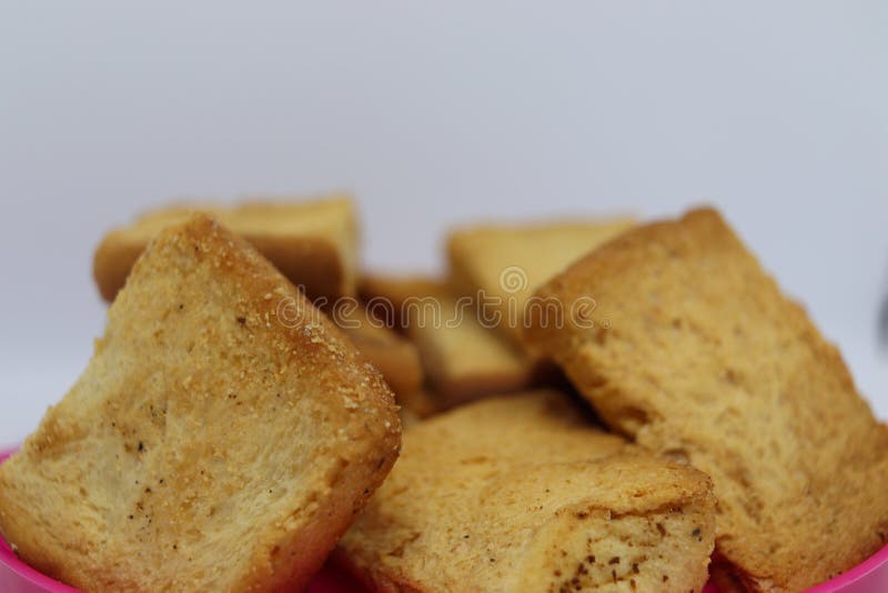 Stack of Plain Melba Toasts on White Background. Edible Square Dry ...