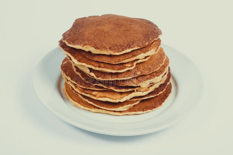 A Stack of Plain Pancakes on a White Plate Background. Isolated Stock ...
