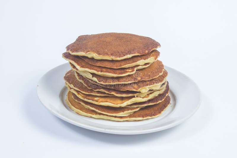A Stack of Plain Pancakes on a White Plate Background. Isolated Stock ...