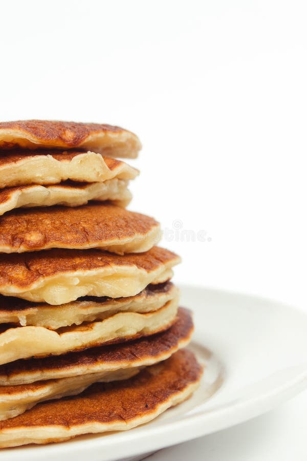 A Stack of Plain Pancakes on a White Plate Background. Isolated Stock ...
