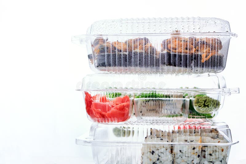 Stack of Plastic Boxes with Sushi Roll Sets. Food Delivery Stock Image ...