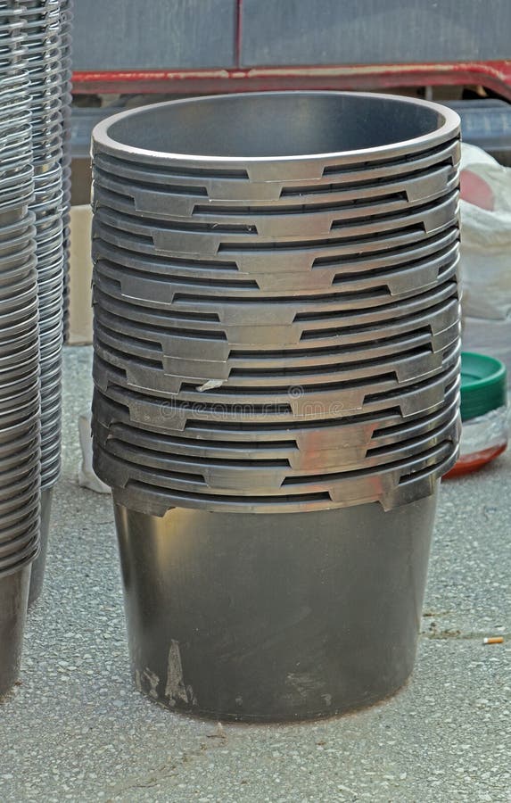 Stack of plastic buckets stock photo. Image of object - 227301906