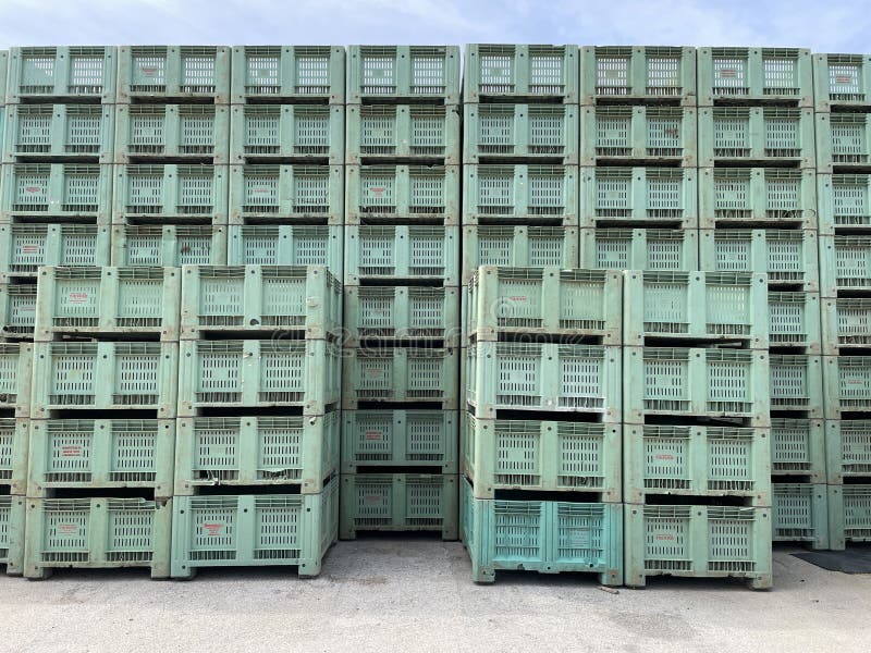 Stack of Plastic Crates of Solid Green Color Outside Storage of ...