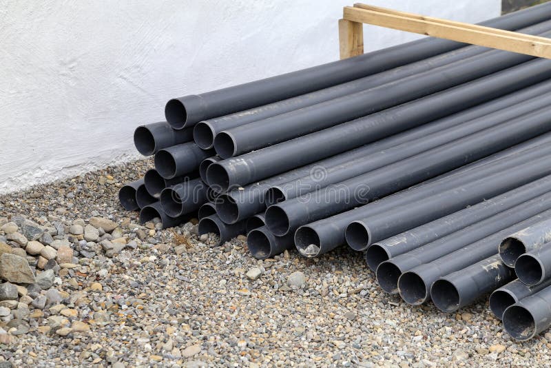 Stack of Plastic Pipes on the Construction Site Stock Photo - Image of ...