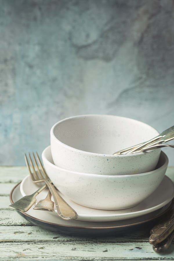 Stack of Plates with Cutlery Stock Image - Image of kitchen ...