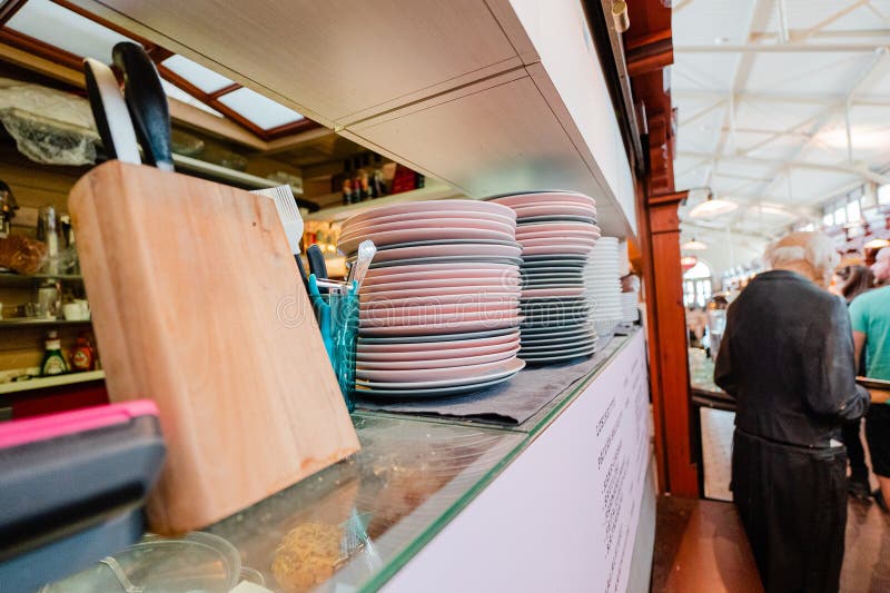 Stack of Plates in a Restaurant Kitchen Stock Photo - Image of form ...