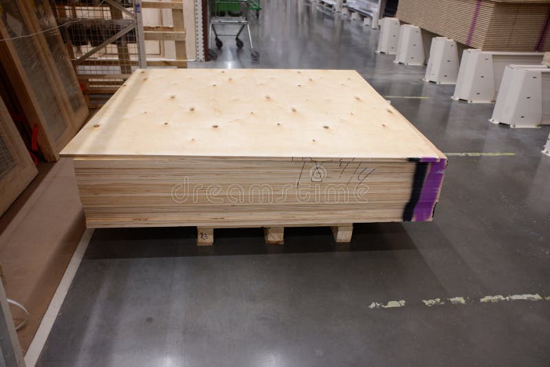 A Stack of Plywood in a Hardware Store. Construction and Repair Stock ...
