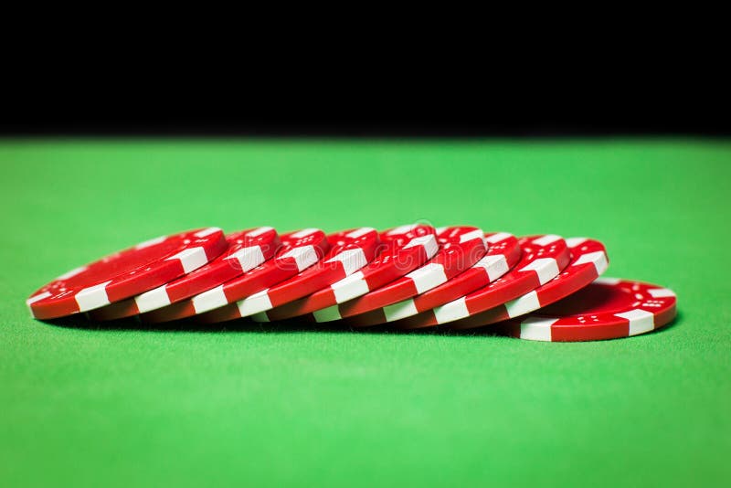Stack of Poker Chips on a Green Table Stock Photo - Image of royal ...