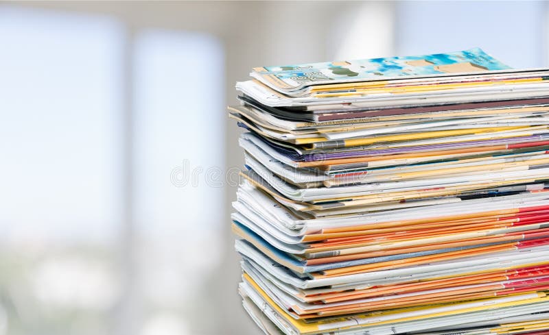Stacked Magazines on Light Background, Close-up Stock Photo - Image of ...