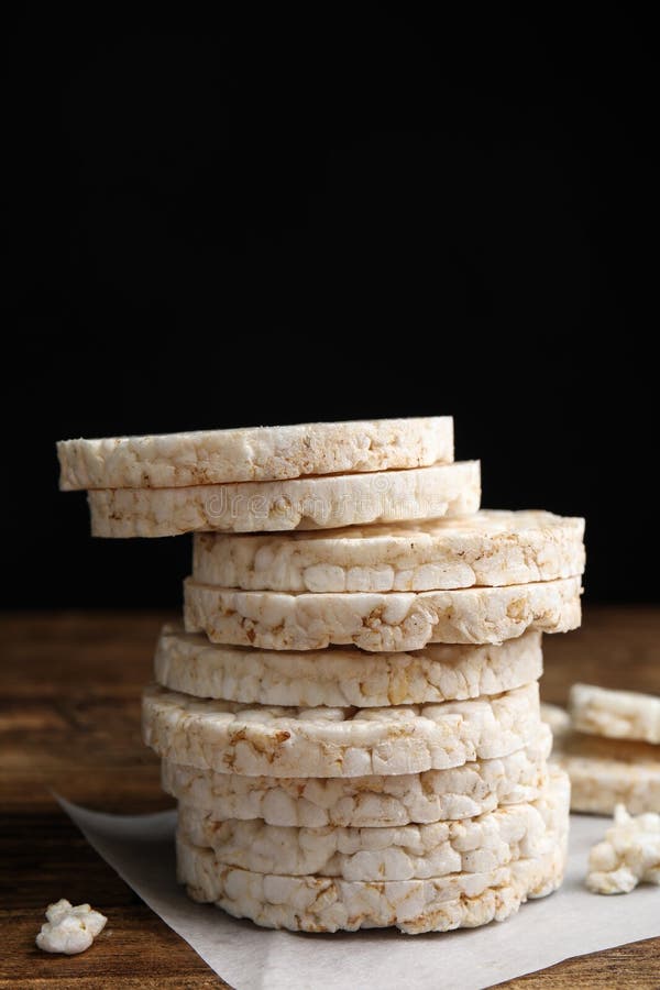 Stack of Puffed Rice Cakes on Table Against Black Background Stock ...