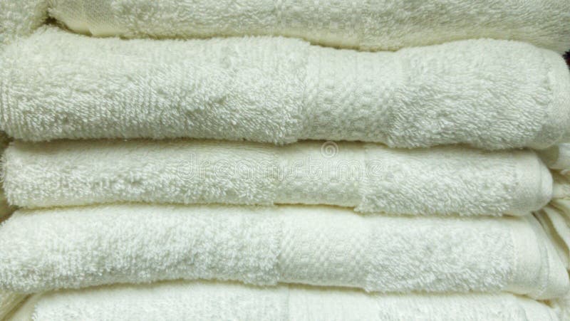Stack of White Towels on Supermarket Stall Display Stock Image - Image ...