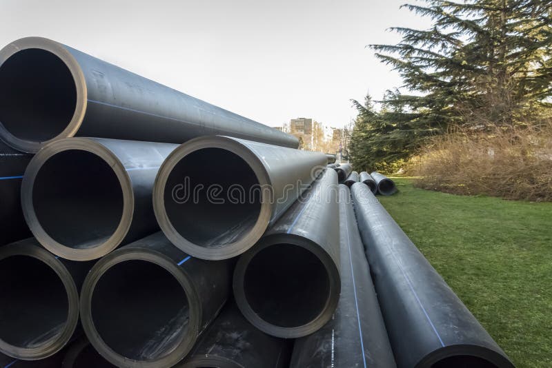 Stack of PVC water pipes stock image. Image of pipes - 106958621