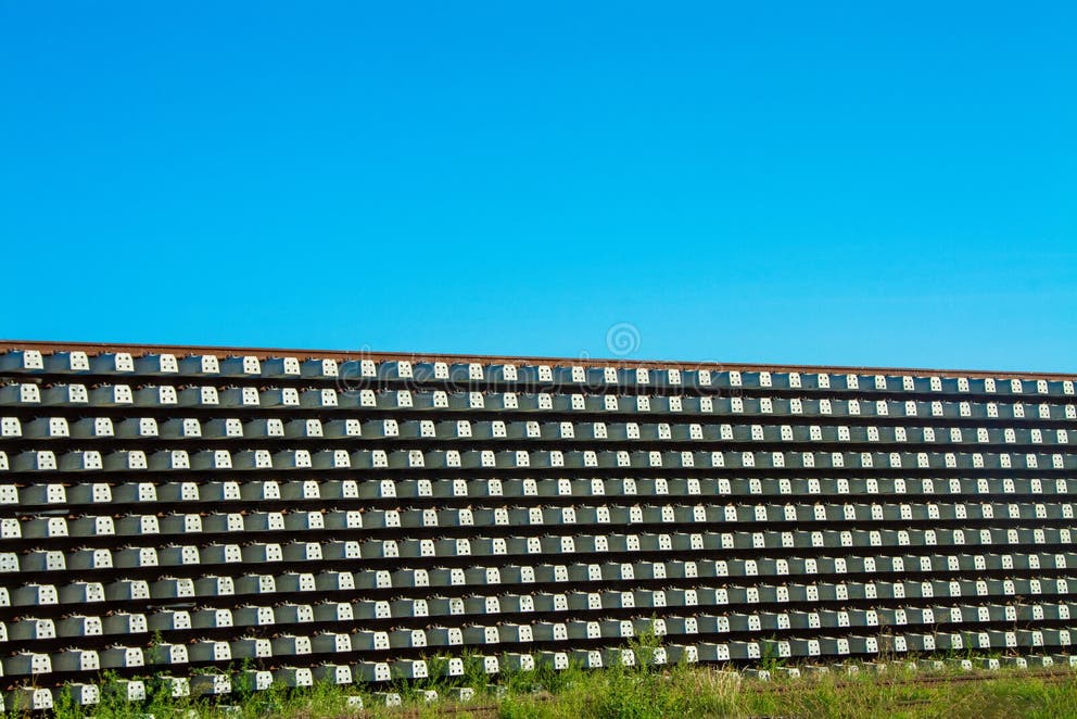 Stack of railway sleepers stock image. Image of stacked - 201017361