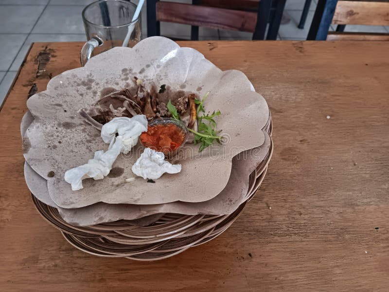 Stack of Rattan Plates with Oil Paper As a Base for Eating. Stacked To ...
