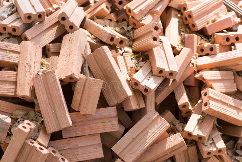Stack of Raw Bricks stock photo. Image of home, industrial - 249505410