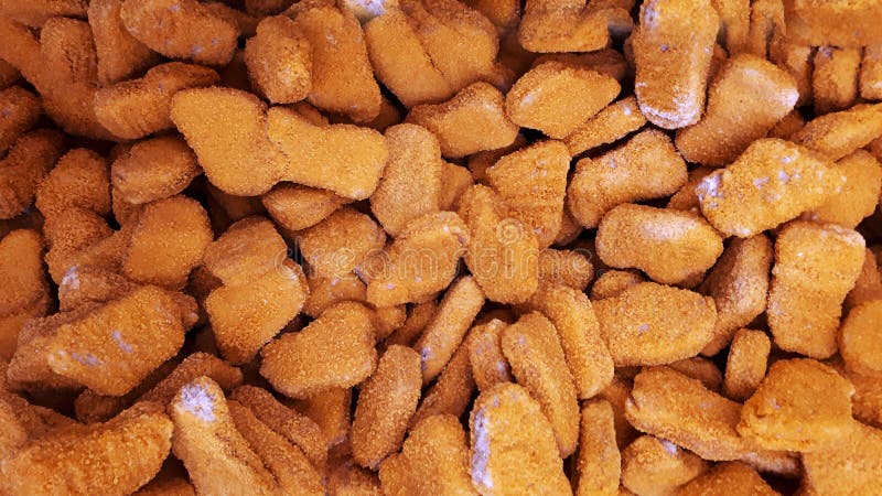 Stack Raw Frozen Chicken Nuggets. Several Chicken Nuggets Stock Image ...