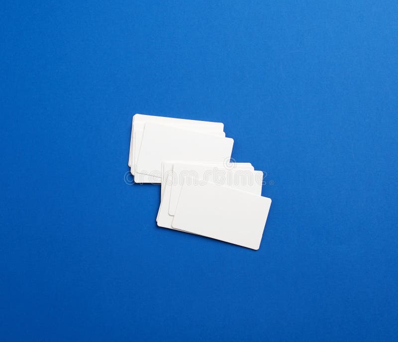 Stack of Rectangular White Blank Business Cards on a Blue Background ...