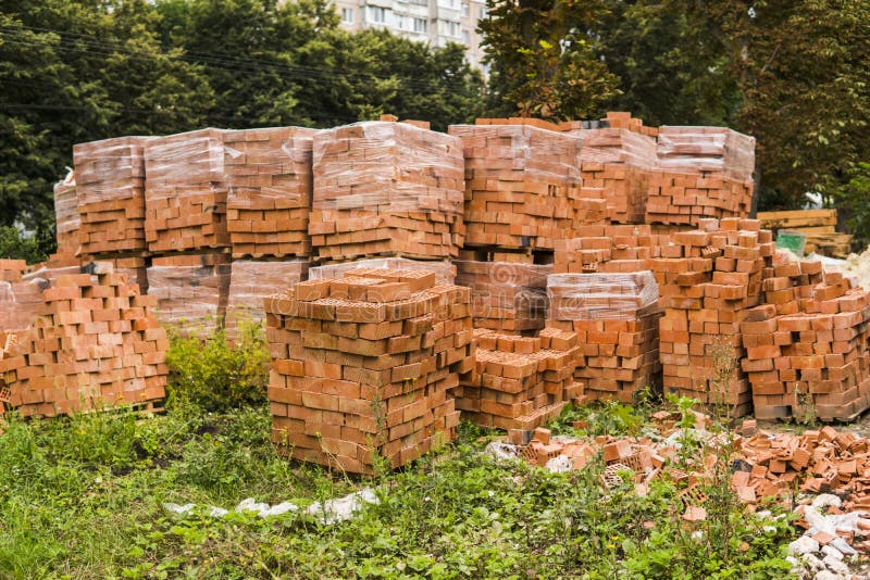 Stack of Red Brick for Construction. Common Quality Building Bricks ...