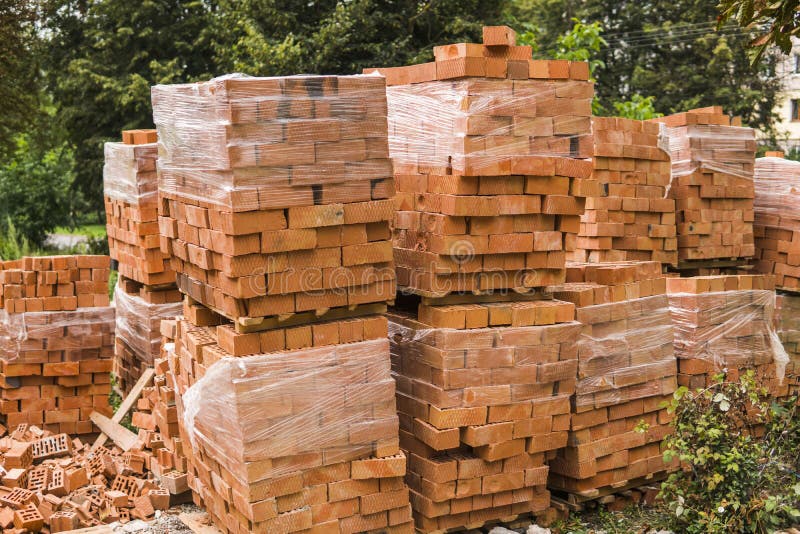 Stack of Red Brick for Construction. Common Quality Building Bricks ...