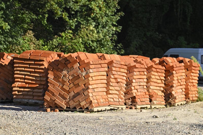 Stack of red brick stock photo. Image of abstract, stone - 230946580