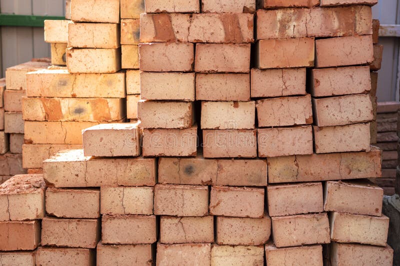 Stack of Red Bricks on Concrete Foundation, Process of House Building ...