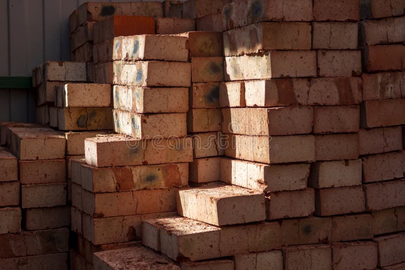 Stack of Red Bricks on Concrete Foundation, Process of House Building ...