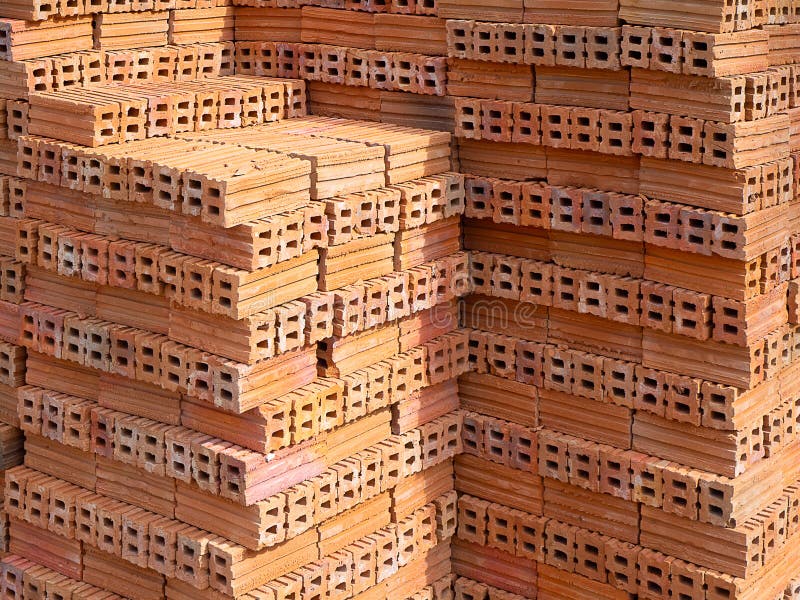 Stack of red bricks. stock photo. Image of construct - 117682864