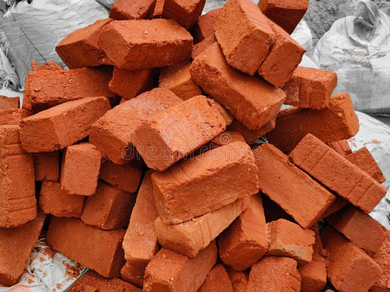 Stack of Red Bricks in Construction Site. Outdoors Stock Image - Image ...