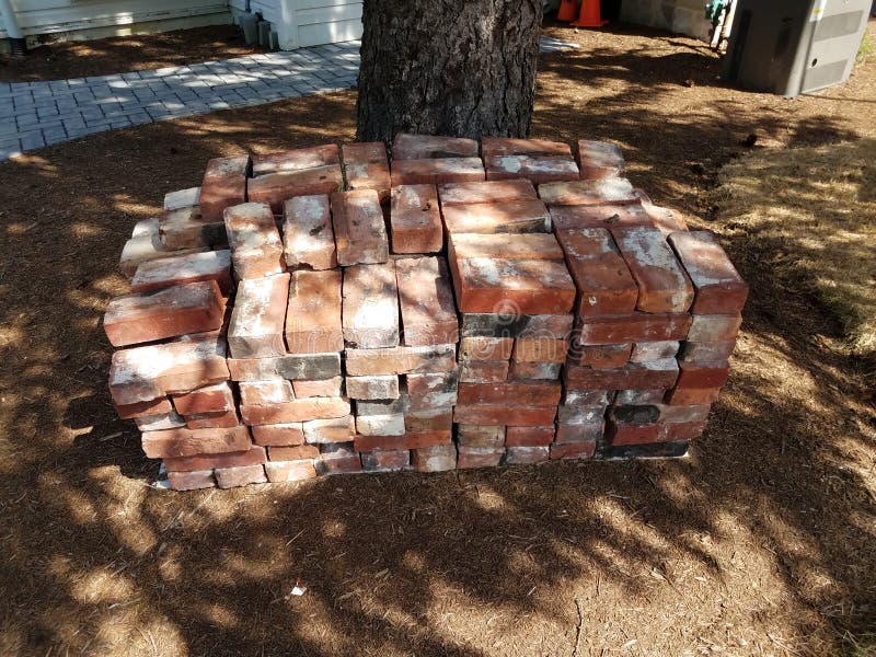 Stack of Red Bricks or Masonry and Tree Stock Image - Image of masonry ...