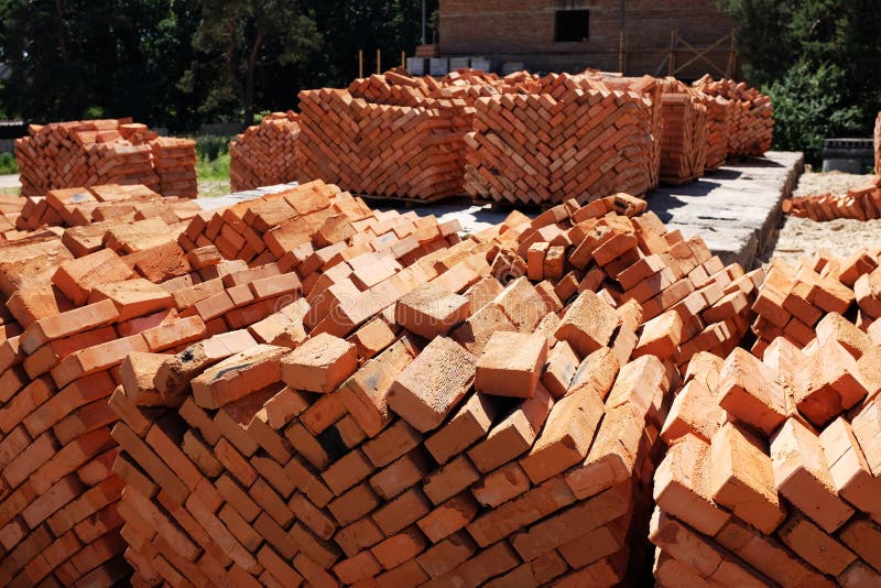 Stack of red bricks stock photo. Image of posture, concepts - 62931648