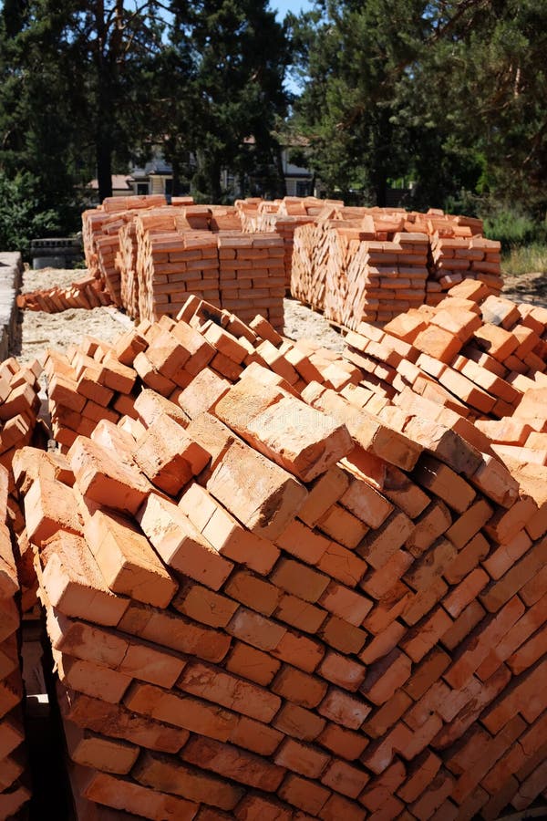 Stack of red bricks stock photo. Image of bricks, industry - 62931916
