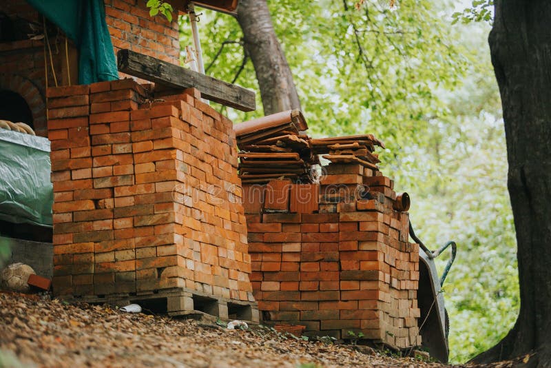 Stack of Red Bricks on Wooden Pallets Stock Image - Image of pallet ...