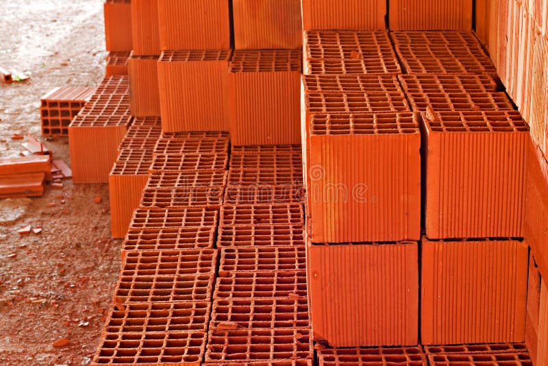 Stack of Red Building Blocks on Messy Site Stock Image - Image of ...