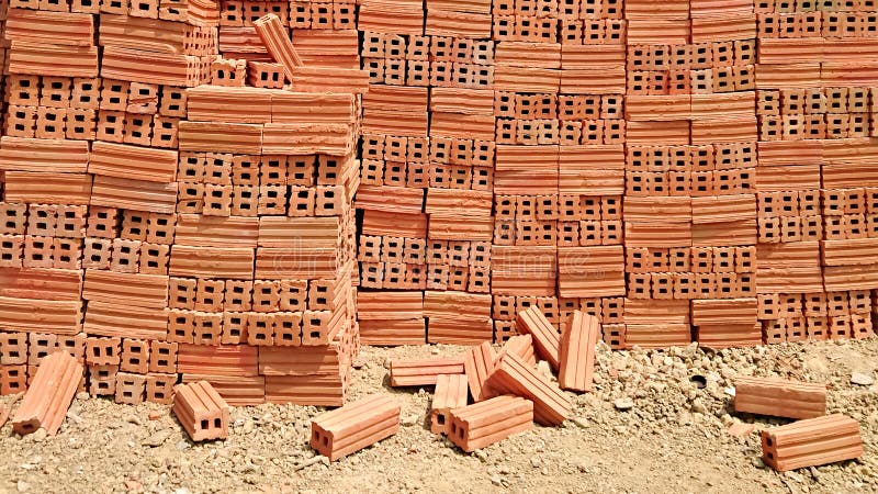 Stack of red clay bricks stock photo. Image of square - 68221278