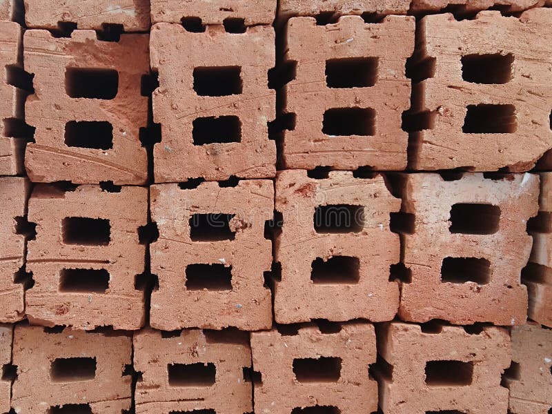 Stack of red clay bricks stock photo. Image of stack - 64329666