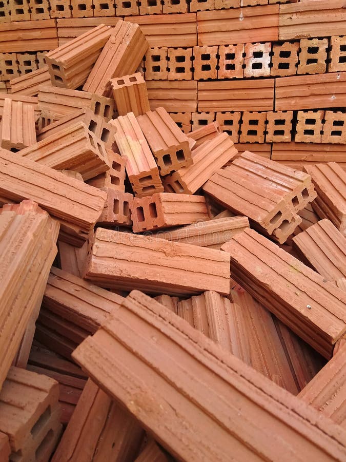 Stack of red clay bricks stock photo. Image of group - 63981462