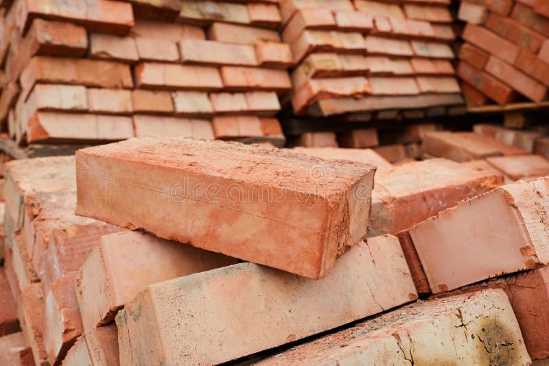 A Stack of Red Clay Bricks in Rows Close Up. Stock Image - Image of ...